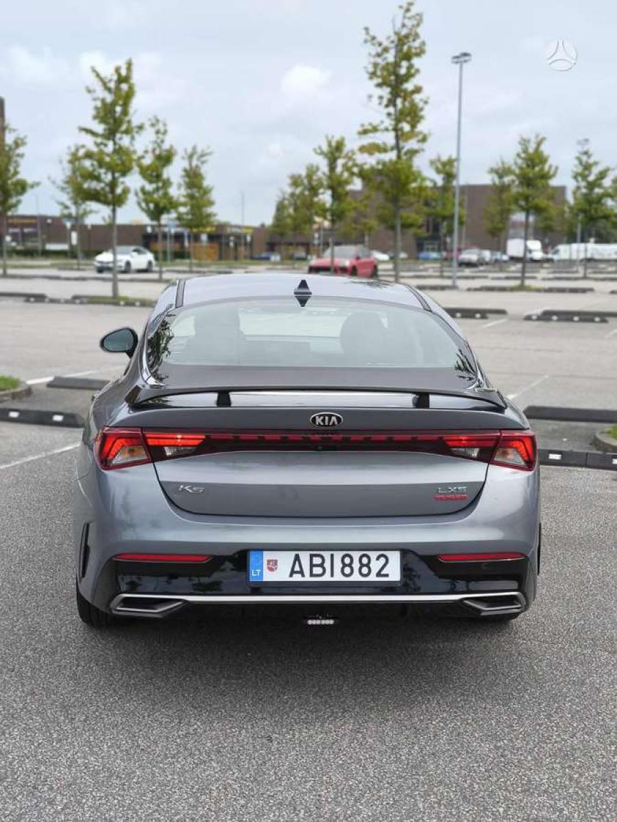 Grey Kia K5 2021 in Klaipeda, with an engine capacity of 1.60 L and mileage of 133 thousand km for 22264 €, photo 4 on AUTOMOTO.COM.LV