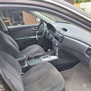 Sarkans Kia Magentis 2007 Kelmė, ar dzinēja tilpumu 2.00 L un nobraukumu 171 tūkst. km par 1000 €, foto 3 vietnē AUTOMOTO.COM.LV