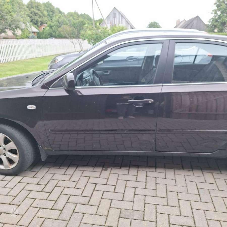 Sarkans Kia Magentis 2007 Kelmė, ar dzinēja tilpumu 2.00 L un nobraukumu 171 tūkst. km par 1000 €, foto 6 vietnē AUTOMOTO.COM.LV