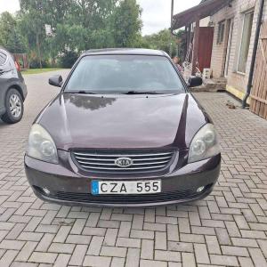 Sarkans Kia Magentis 2007 Kelmė, ar dzinēja tilpumu 2.00 L un nobraukumu 171 tūkst. km par 1000 €, foto 7 vietnē AUTOMOTO.COM.LV