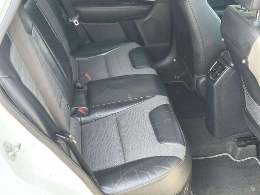 Black Kia Niro 2016 in Vilnius, with an engine capacity of 1.60 L and mileage of 308 thousand km for 9500 €, photo 10 on AUTOMOTO.COM.LV