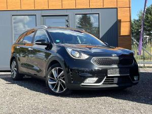 Black Kia Niro 2017 in Kaunas, with an engine capacity of 1.59 L and mileage of 235 thousand km for 11500 €, photo  on AUTOMOTO.COM.LV