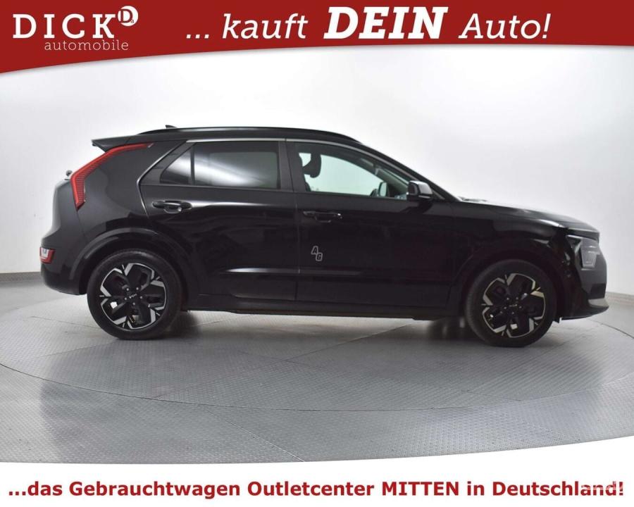 Black Kia Niro 2023 in Kaunas, with an engine capacity of 0.00 L and mileage of 56 thousand km for 26673 €, photo 5 on AUTOMOTO.COM.LV
