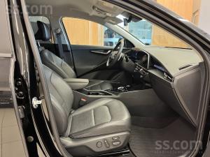 Black Kia Niro 2023 in Riga, with an engine capacity of 0.00 L and mileage of 17 thousand km for 33900 €, photo 16 on AUTOMOTO.COM.LV