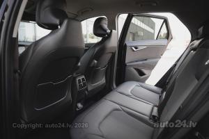 Black Kia Niro 2023 in Tartu, with an engine capacity of 1.80 L and mileage of 17 thousand km for 26900 €, photo 14 on AUTOMOTO.COM.LV