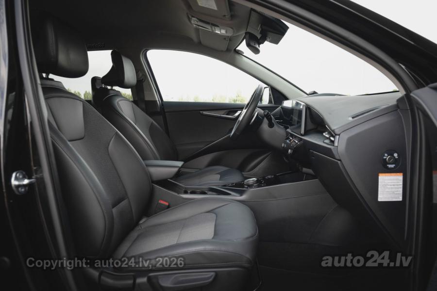 Black Kia Niro 2023 in Tartu, with an engine capacity of 1.80 L and mileage of 17 thousand km for 26900 €, photo 17 on AUTOMOTO.COM.LV
