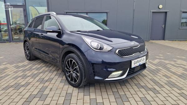 Zils Kia Niro 2018 Šauļi, ar dzinēja tilpumu 1.60 L un nobraukumu 230 tūkst. km par 11500 €, foto  vietnē AUTOMOTO.COM.LV