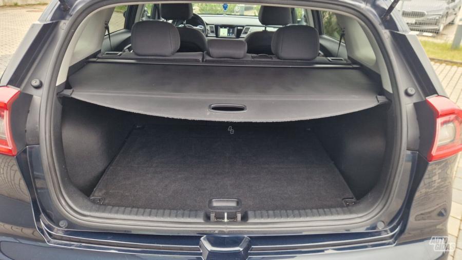 Blue Kia Niro 2018 in Siauliai, with an engine capacity of 1.60 L and mileage of 230 thousand km for 11500 €, photo 17 on AUTOMOTO.COM.LV
