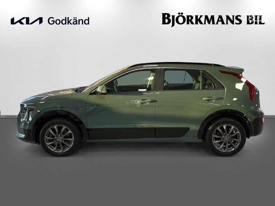 Green Kia Niro 2023 in Kaunas, with an engine capacity of 0.00 L and mileage of 55 thousand km for 30295 €, photo 4 on AUTOMOTO.COM.LV