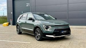 Green Kia Niro 2023 in Vilnius, with an engine capacity of 1.58 L and mileage of 73 thousand km for 21990 €, photo 4 on AUTOMOTO.COM.LV