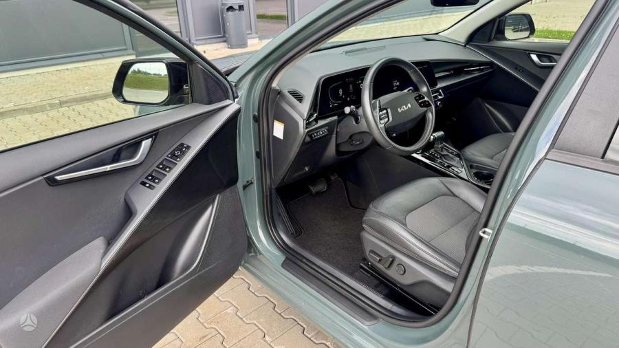 Green Kia Niro 2023 in Vilnius, with an engine capacity of 1.58 L and mileage of 73 thousand km for 21990 €, photo 16 on AUTOMOTO.COM.LV