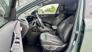 Green Kia Niro 2023 in Vilnius, with an engine capacity of 1.58 L and mileage of 73 thousand km for 21990 €, photo 18 on AUTOMOTO.COM.LV