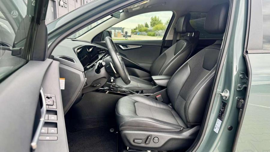 Green Kia Niro 2023 in Vilnius, with an engine capacity of 1.58 L and mileage of 73 thousand km for 21990 €, photo 18 on AUTOMOTO.COM.LV
