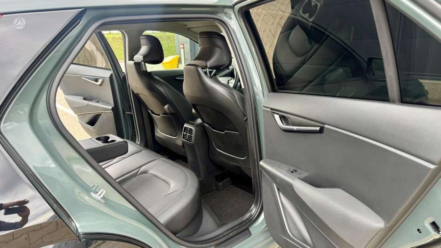 Green Kia Niro 2023 in Vilnius, with an engine capacity of 1.58 L and mileage of 73 thousand km for 21990 €, photo 22 on AUTOMOTO.COM.LV