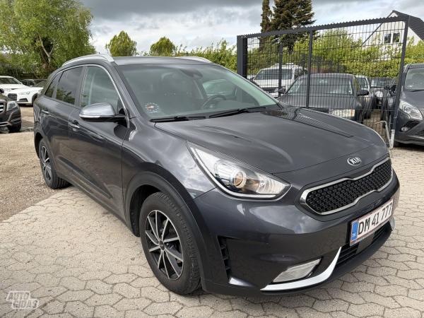 Grey Kia Niro 2017 in Vilnius, with an engine capacity of 1.60 L and mileage of 170 thousand km for 10900 €, photo 2 on AUTOMOTO.COM.LV