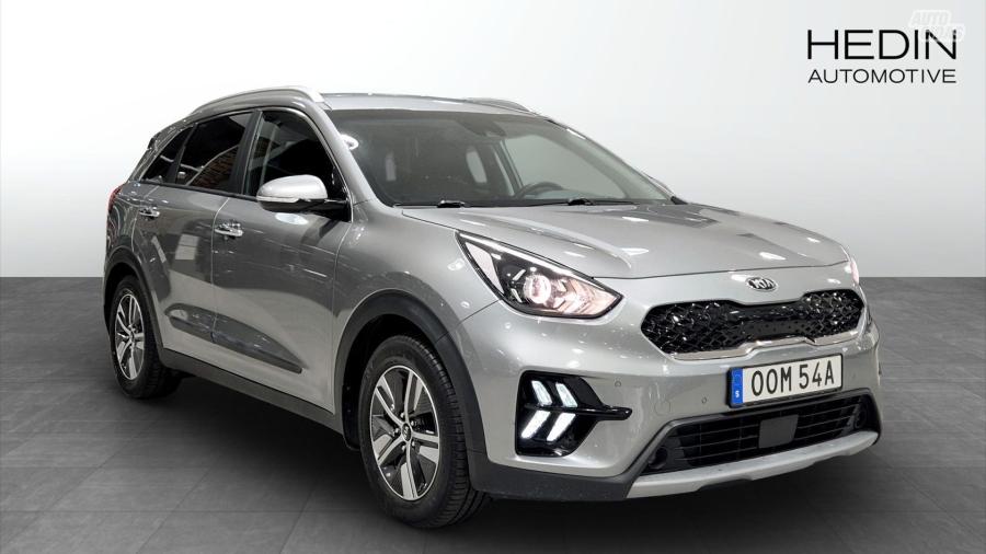 Grey Kia Niro 2021 in Kaunas, with an engine capacity of 0.00 L and mileage of 63 thousand km for 24397 €, photo 1 on AUTOMOTO.COM.LV