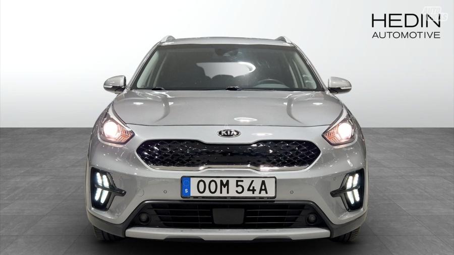 Grey Kia Niro 2021 in Kaunas, with an engine capacity of 0.00 L and mileage of 63 thousand km for 24397 €, photo 2 on AUTOMOTO.COM.LV