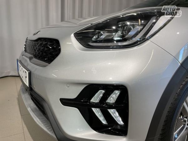 Grey Kia Niro 2021 in Kaunas, with an engine capacity of 0.00 L and mileage of 86 thousand km for 22921 €, photo 3 on AUTOMOTO.COM.LV