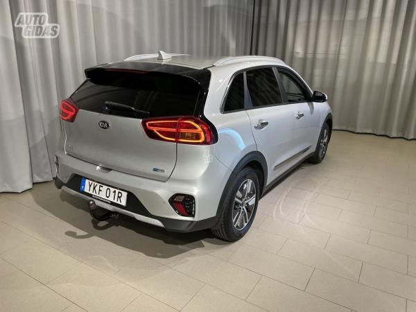Grey Kia Niro 2021 in Kaunas, with an engine capacity of 0.00 L and mileage of 86 thousand km for 22921 €, photo 5 on AUTOMOTO.COM.LV