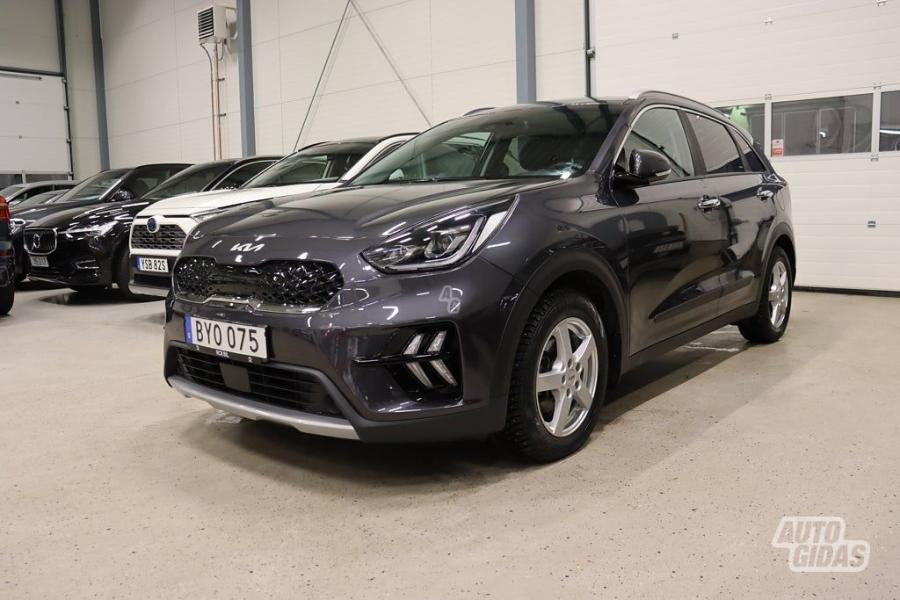 Grey Kia Niro 2022 in Kaunas, with an engine capacity of 0.00 L and mileage of 73 thousand km for 25366 €, photo 1 on AUTOMOTO.COM.LV