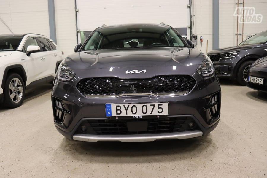 Grey Kia Niro 2022 in Kaunas, with an engine capacity of 0.00 L and mileage of 73 thousand km for 25366 €, photo 3 on AUTOMOTO.COM.LV