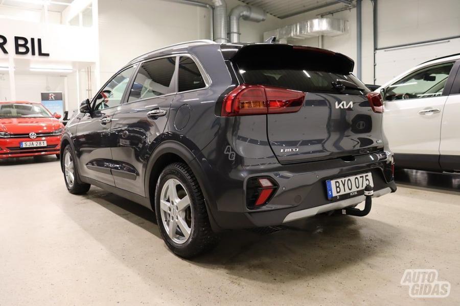Grey Kia Niro 2022 in Kaunas, with an engine capacity of 0.00 L and mileage of 73 thousand km for 25366 €, photo 4 on AUTOMOTO.COM.LV