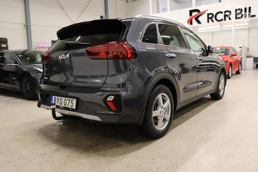 Grey Kia Niro 2022 in Kaunas, with an engine capacity of 0.00 L and mileage of 73 thousand km for 25366 €, photo 5 on AUTOMOTO.COM.LV