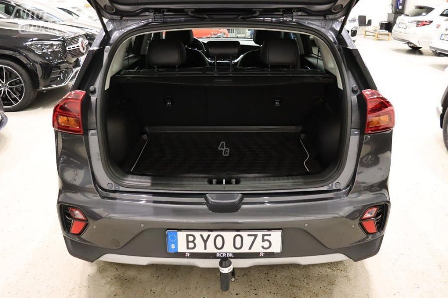 Grey Kia Niro 2022 in Kaunas, with an engine capacity of 0.00 L and mileage of 73 thousand km for 25366 €, photo 6 on AUTOMOTO.COM.LV