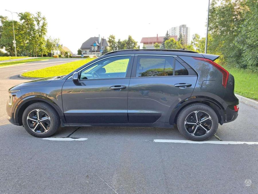 Grey Kia Niro 2023 in Klaipeda, with an engine capacity of 1.58 L and mileage of 73 thousand km for 22500 €, photo 8 on AUTOMOTO.COM.LV