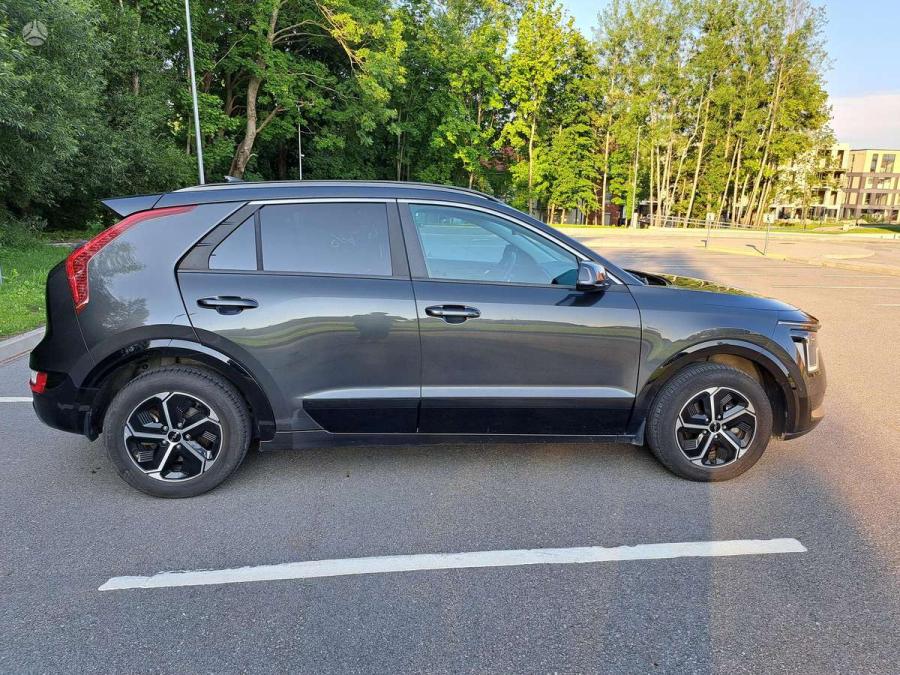 Grey Kia Niro 2023 in Klaipeda, with an engine capacity of 1.58 L and mileage of 73 thousand km for 22500 €, photo 13 on AUTOMOTO.COM.LV