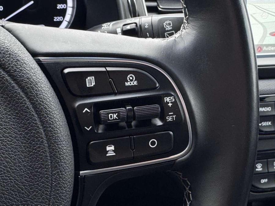 Grey Kia Niro 2018 in Vilnius, with an engine capacity of 1.60 L and mileage of 124 thousand km for 12850 €, photo 18 on AUTOMOTO.COM.LV