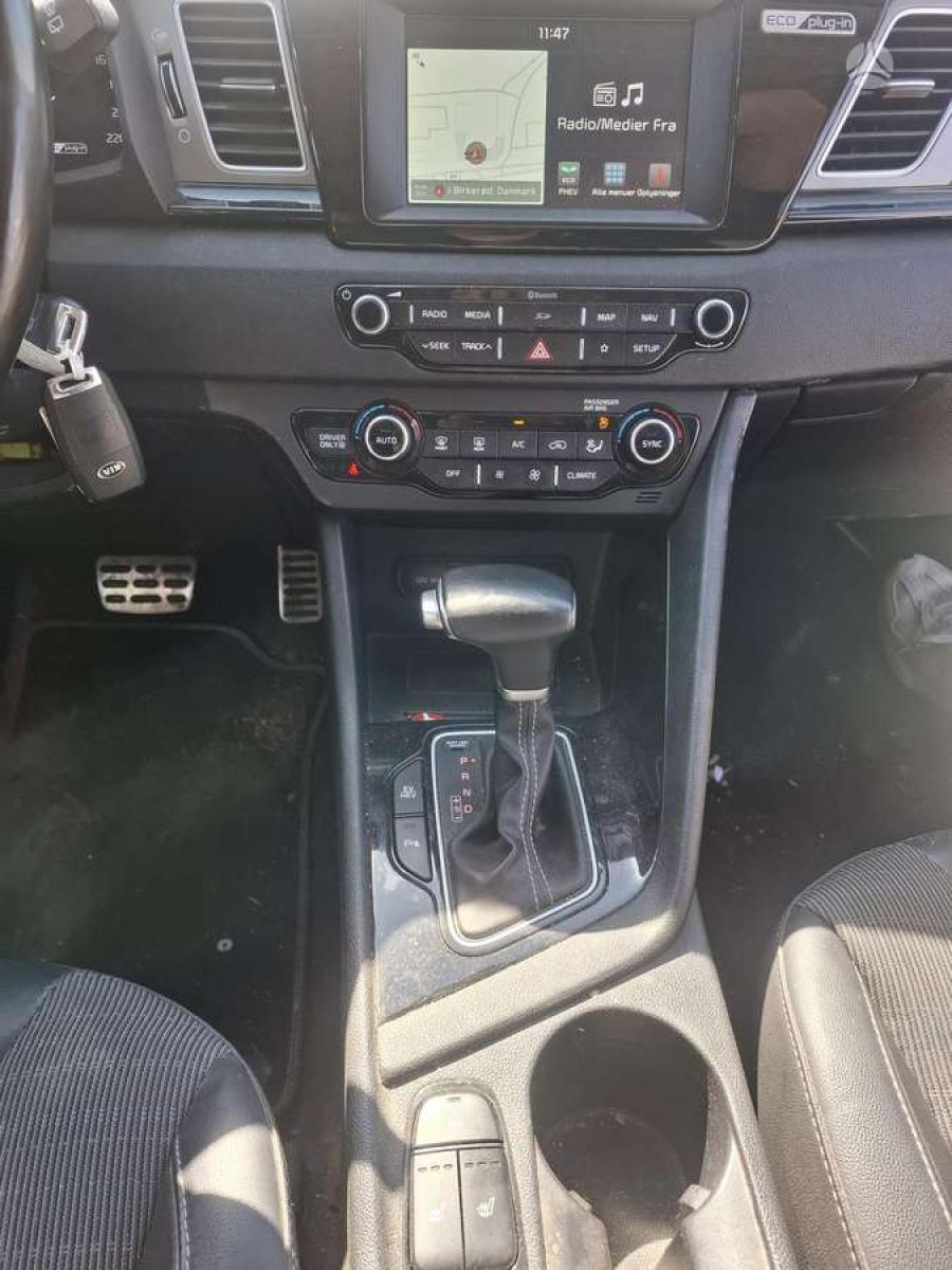 Grey Kia Niro 2019 in Marijampole, with an engine capacity of 1.58 L and mileage of 91 thousand km for 7400 €, photo 13 on AUTOMOTO.COM.LV