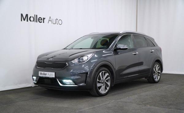 Grey Kia Niro 2018 in Tallinn, with an engine capacity of 1.60 L and mileage of 90 thousand km for 15050 €, photo 1 on AUTOMOTO.COM.LV