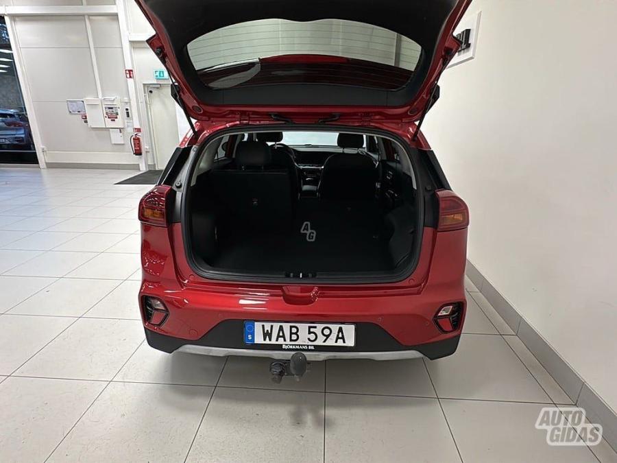 Red Kia Niro 2021 in Kaunas, with an engine capacity of 0.00 L and mileage of 57 thousand km for 24664 €, photo 24 on AUTOMOTO.COM.LV
