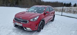 Red Kia Niro 2017 in Vilnius, with an engine capacity of 1.60 L and mileage of 180 thousand km for 7999 €, photo  on AUTOMOTO.COM.LV