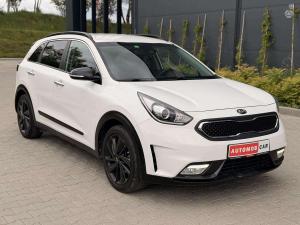 White Kia Niro 2016 in Vilnius, with an engine capacity of 1.60 L and mileage of 308 thousand km for 8950 €, photo 4 on AUTOMOTO.COM.LV