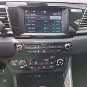 White Kia Niro 2019 in Vilnius, with an engine capacity of 1.60 L and mileage of 67 thousand km for 15800 €, photo 13 on AUTOMOTO.COM.LV