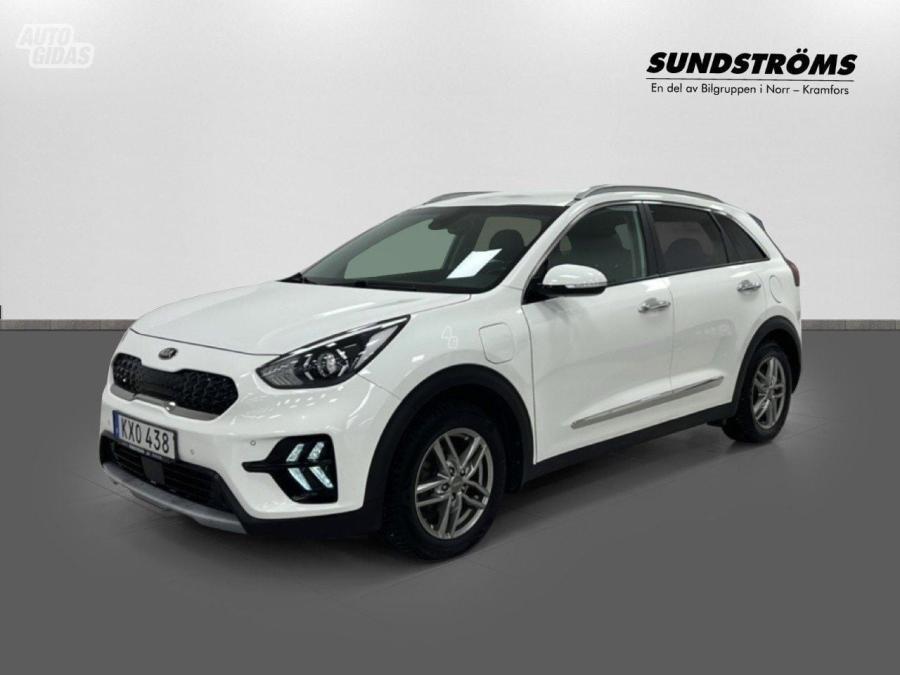 White Kia Niro 2021 in Kaunas, with an engine capacity of 0.00 L and mileage of 83 thousand km for 23595 €, photo 1 on AUTOMOTO.COM.LV