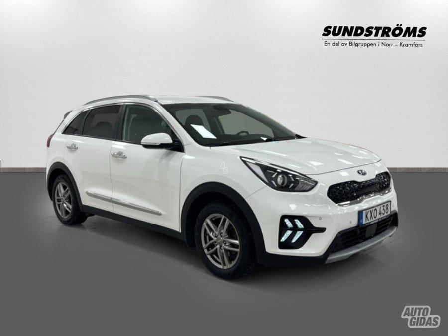 White Kia Niro 2021 in Kaunas, with an engine capacity of 0.00 L and mileage of 83 thousand km for 23595 €, photo 4 on AUTOMOTO.COM.LV