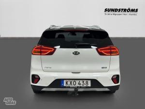 White Kia Niro 2021 in Kaunas, with an engine capacity of 0.00 L and mileage of 83 thousand km for 23595 €, photo 6 on AUTOMOTO.COM.LV