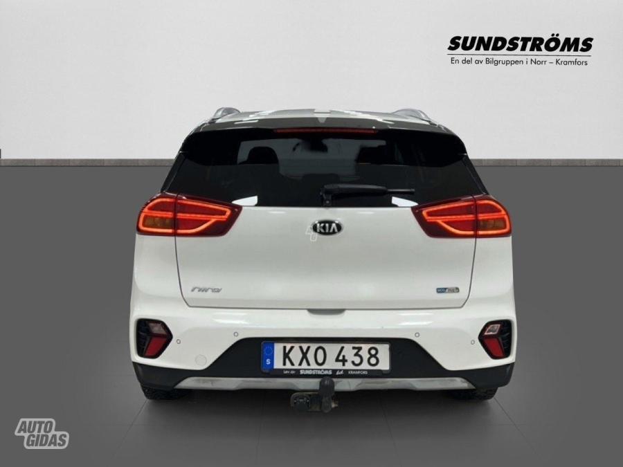 White Kia Niro 2021 in Kaunas, with an engine capacity of 0.00 L and mileage of 83 thousand km for 23595 €, photo 6 on AUTOMOTO.COM.LV