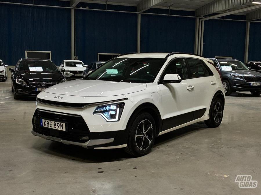 White Kia Niro 2023 in Kaunas, with an engine capacity of 0.00 L and mileage of 97 thousand km for 26524 €, photo 7 on AUTOMOTO.COM.LV