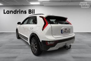 White Kia Niro 2023 in Kaunas, with an engine capacity of 0.00 L and mileage of 74 thousand km for 27282 €, photo 7 on AUTOMOTO.COM.LV