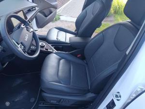 White Kia Niro 2025 in Marijampole, with an engine capacity of 0.00 L and mileage of 10 thousand km for 24999 €, photo 22 on AUTOMOTO.COM.LV