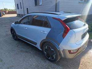 White Kia Niro 2025 in Marijampole, with an engine capacity of 0.00 L and mileage of 10 thousand km for 24999 €, photo 31 on AUTOMOTO.COM.LV