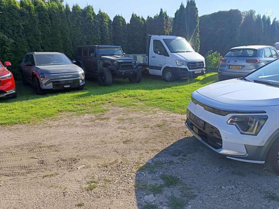 White Kia Niro 2025 in Marijampole, with an engine capacity of 0.00 L and mileage of 10 thousand km for 24999 €, photo 36 on AUTOMOTO.COM.LV