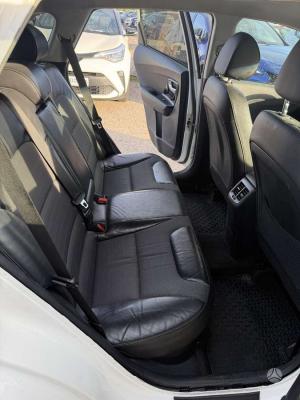 White Kia Niro 2017 in Panevezys, with an engine capacity of 1.58 L and mileage of 281 thousand km for 8300 €, photo 11 on AUTOMOTO.COM.LV