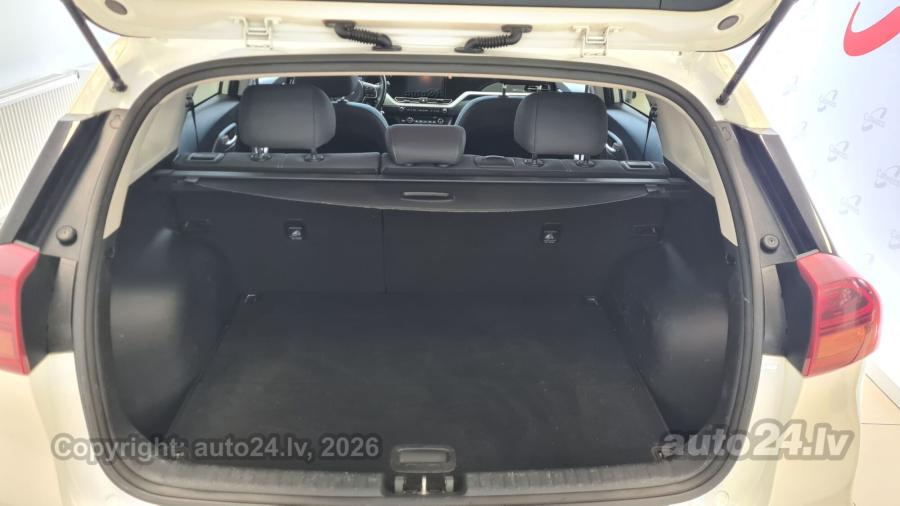 White Kia Niro 2021 in Tartu, with an engine capacity of 1.60 L and mileage of 104 thousand km for 16900 €, photo 18 on AUTOMOTO.COM.LV