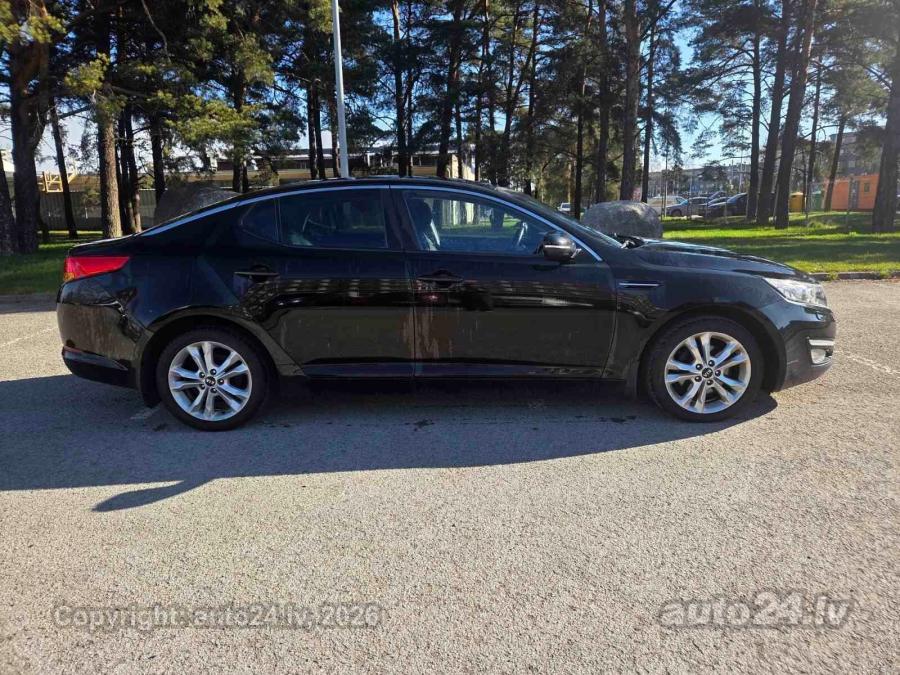 Black Kia Optima 2012 in Tallinn, with an engine capacity of 1.70 L and mileage of 205 thousand km for 4999 €, photo 4 on AUTOMOTO.COM.LV