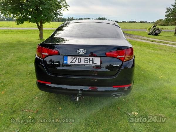 Black Kia Optima 2012 in Rakvere, with an engine capacity of 1.70 L and mileage of 62 thousand km for 6999 €, photo 7 on AUTOMOTO.COM.LV